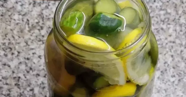 Mga pipino na may lemon para sa taglamig sa mga garapon ng litro: sunud-sunod na mga recipe, pagsusuri 10016_7